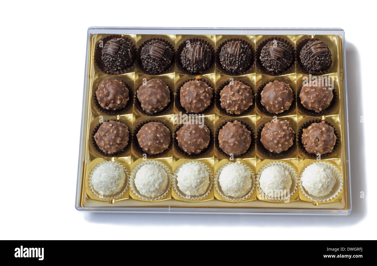 Fragment of the open blue boxes of chocolates. Presented on a white ...
