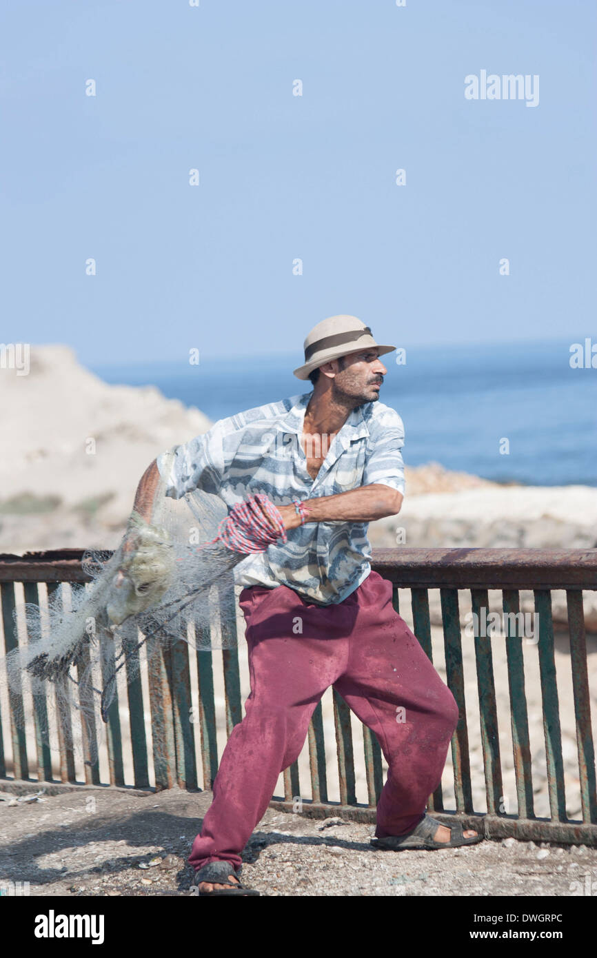 Man throwing fishing net hi-res stock photography and images - Alamy