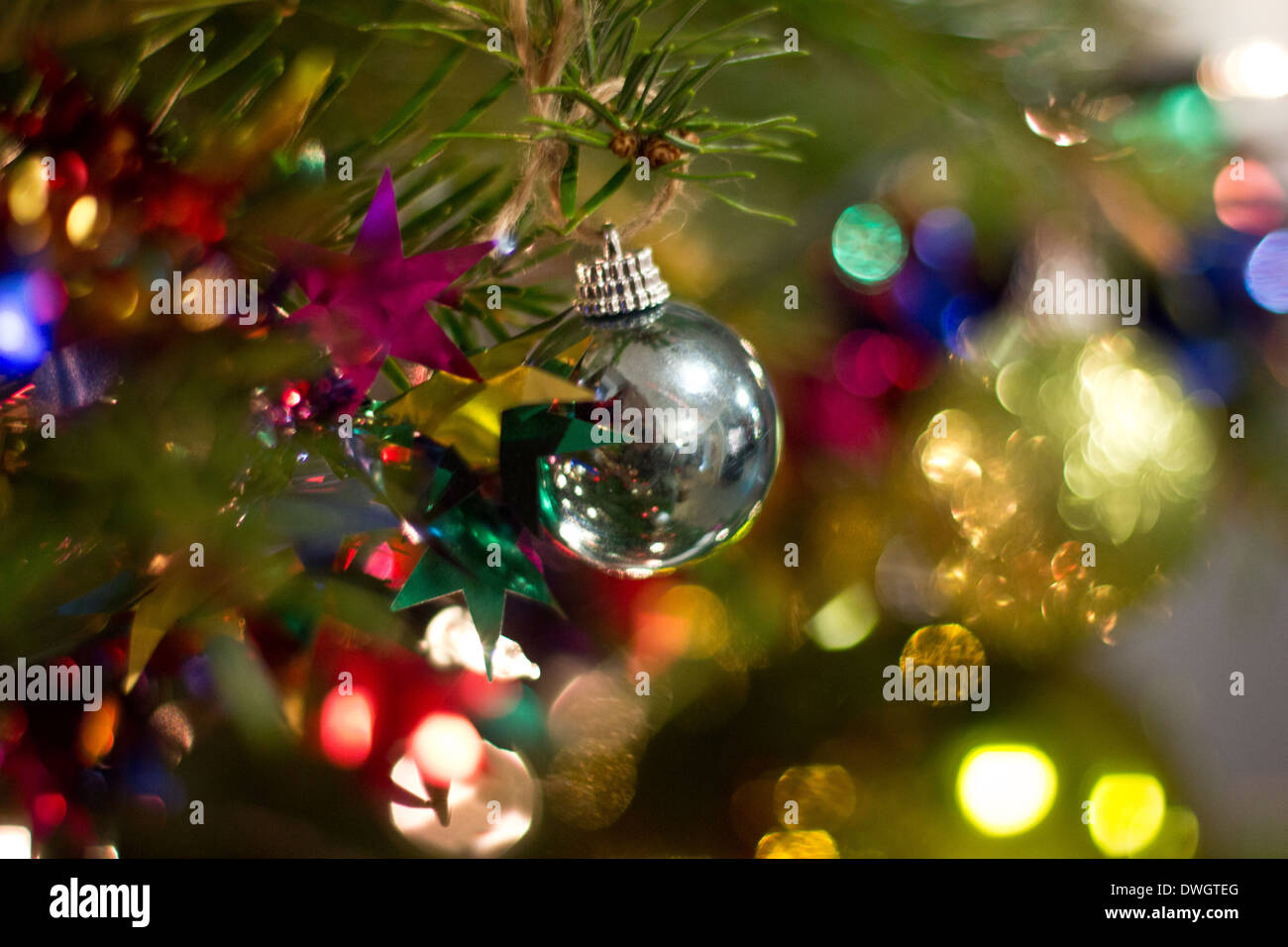 Silver tinsel christmas tree hi-res stock photography and images - Alamy