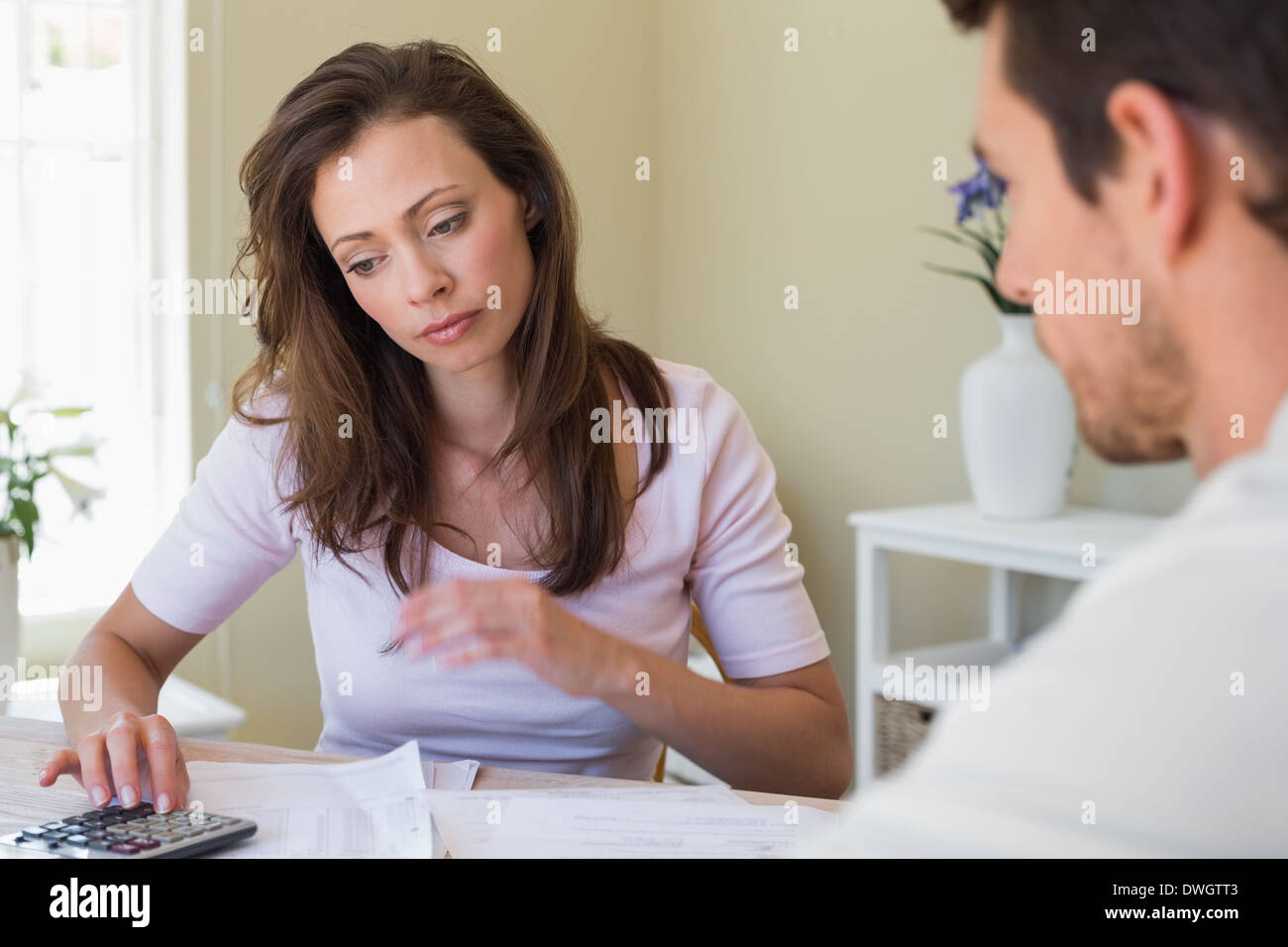 Woman table bills hi-res stock photography and images - Alamy