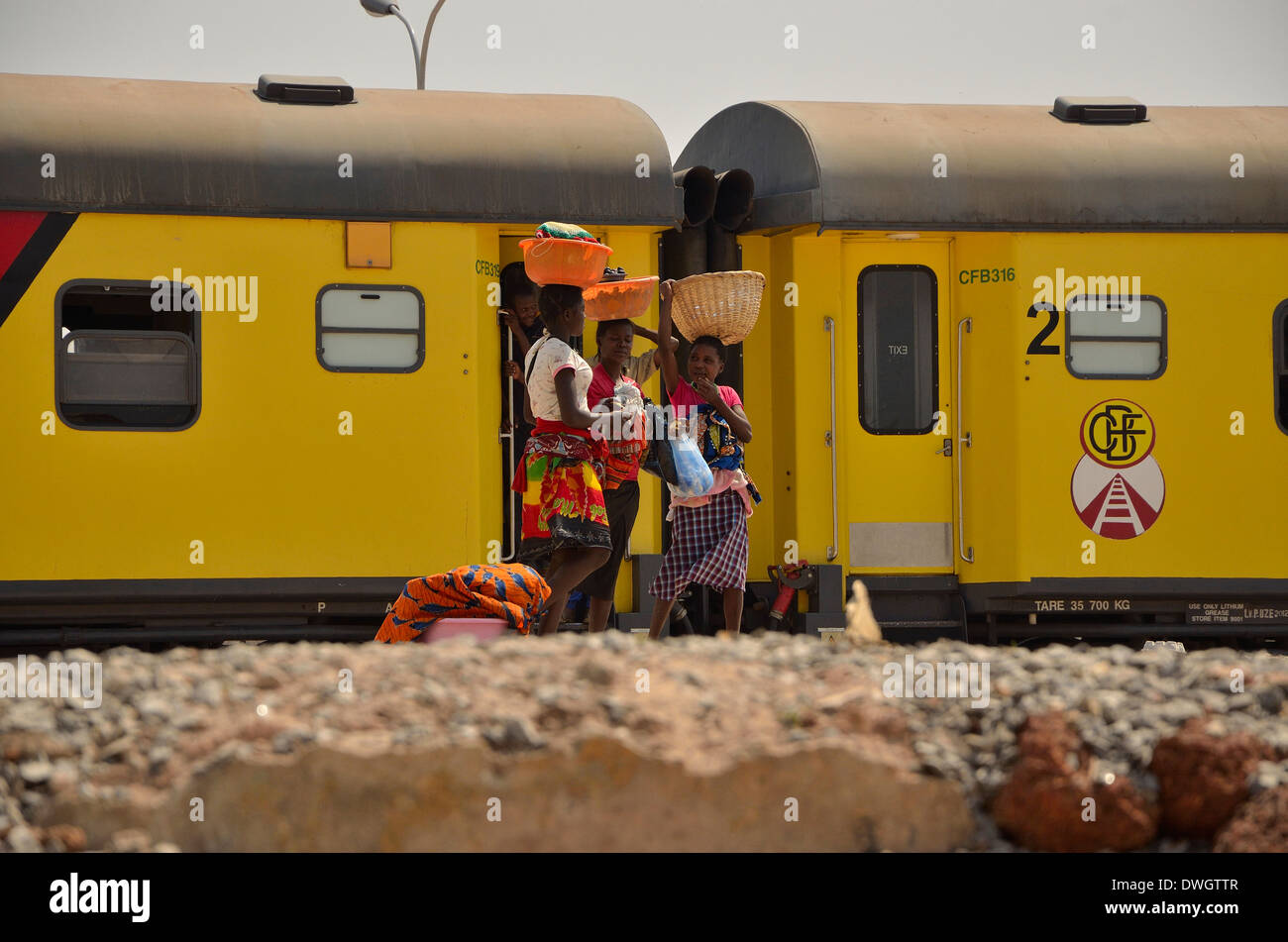 Locals selling wares to train passengers. Angola. Africa Stock Photo ...