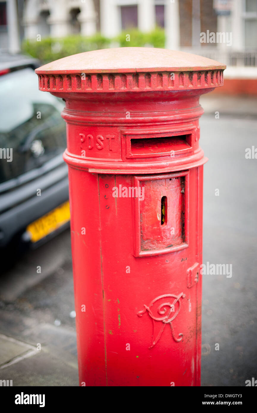 Old, British red Post box in city street Stock Photo - Alamy