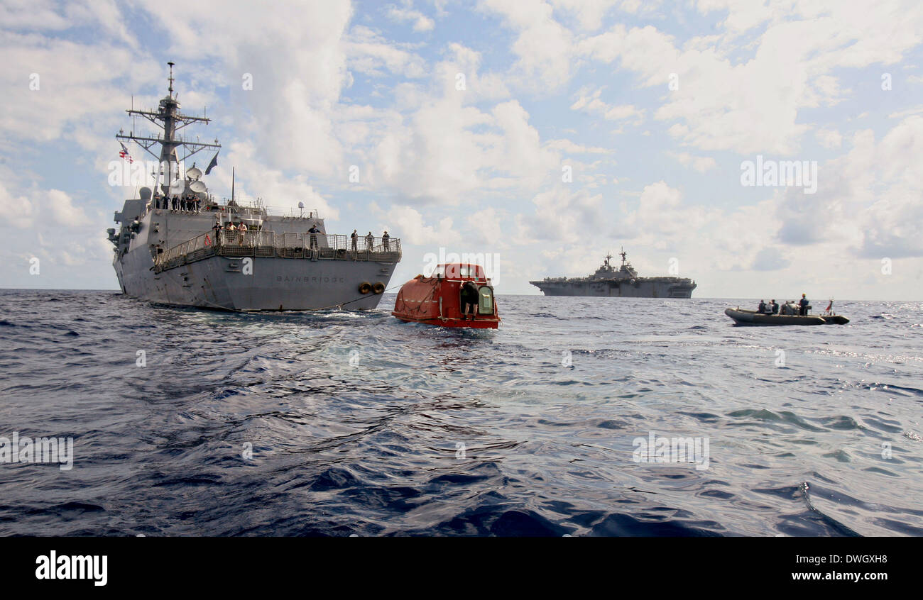 US Navy guided-missile destroyer USS Bainbridge tows the lifeboat from ...