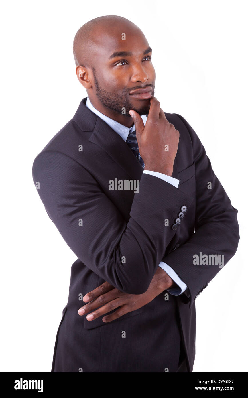 Portrait of a young African American business man thinking, isolated on ...