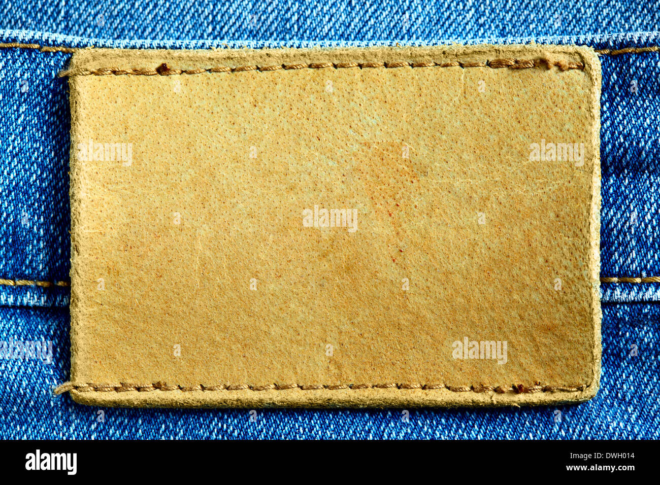 Jeans with blank leather label for your own text Stock Photo - Alamy