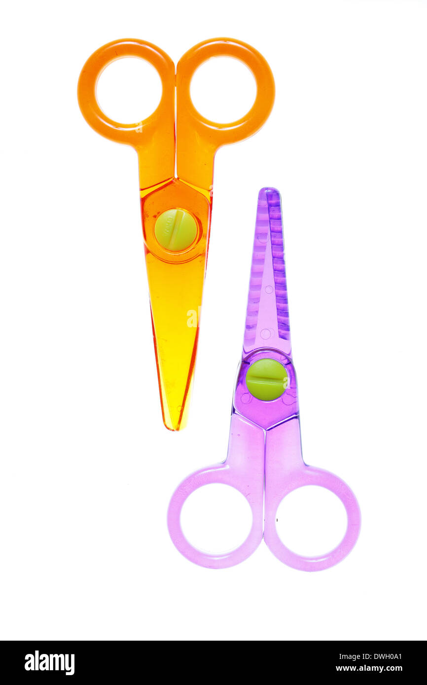 Toy scissors isolated over white background Stock Photo - Alamy