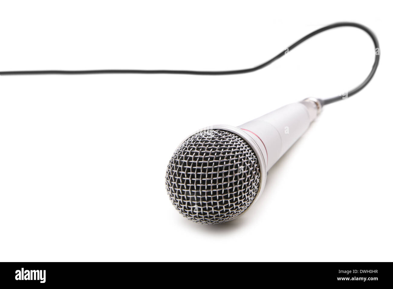 Microphone with cable isolated over white background Stock Photo - Alamy