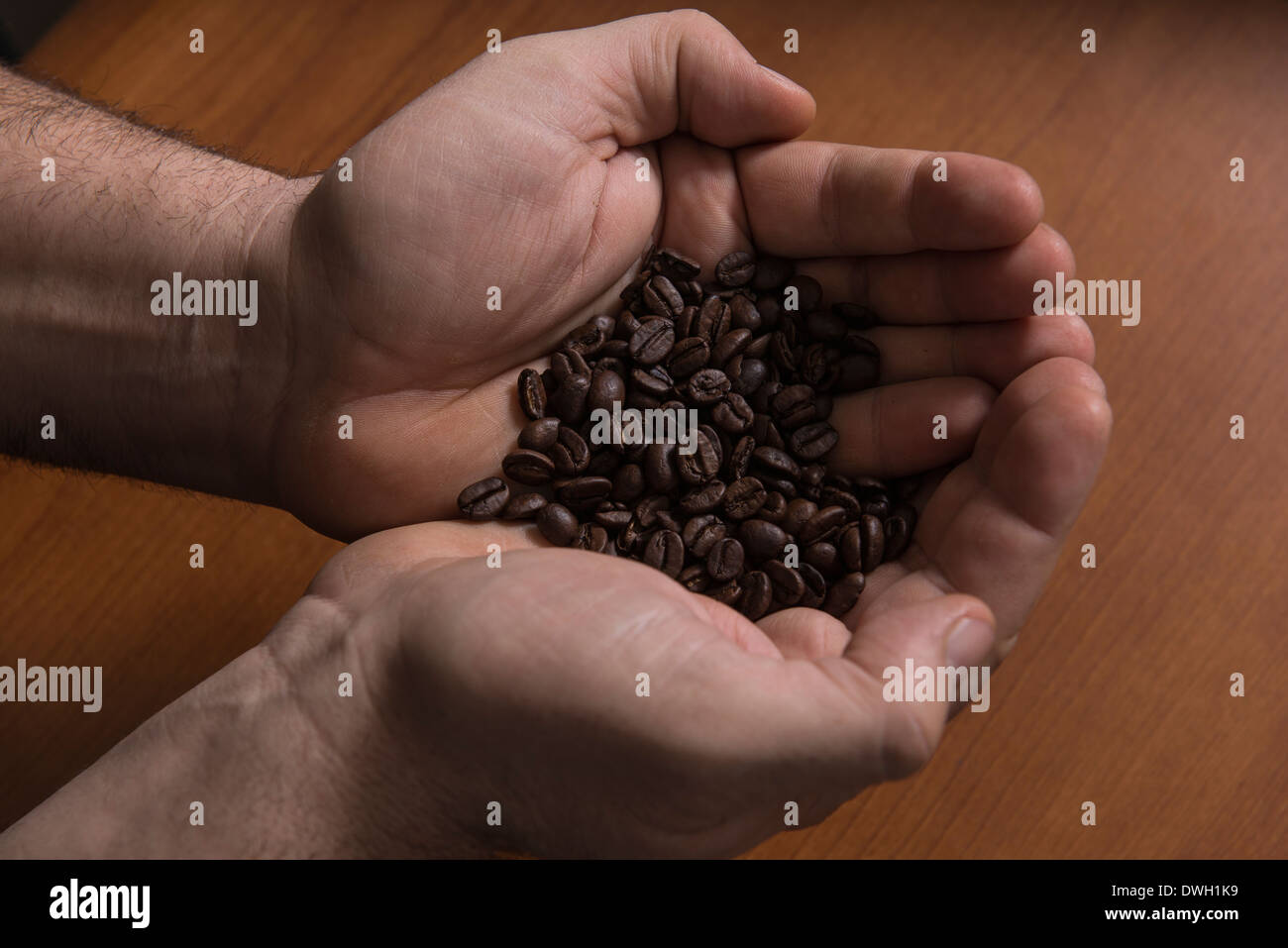 hands and coffe bean Stock Photo - Alamy