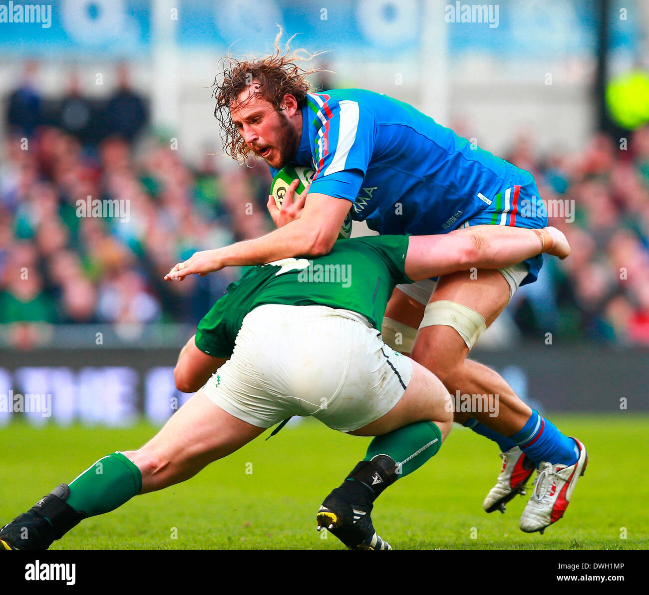 Dublin, Ireland. 08th Mar, 2014. Joshua Furno (Italy) runs in to a ...