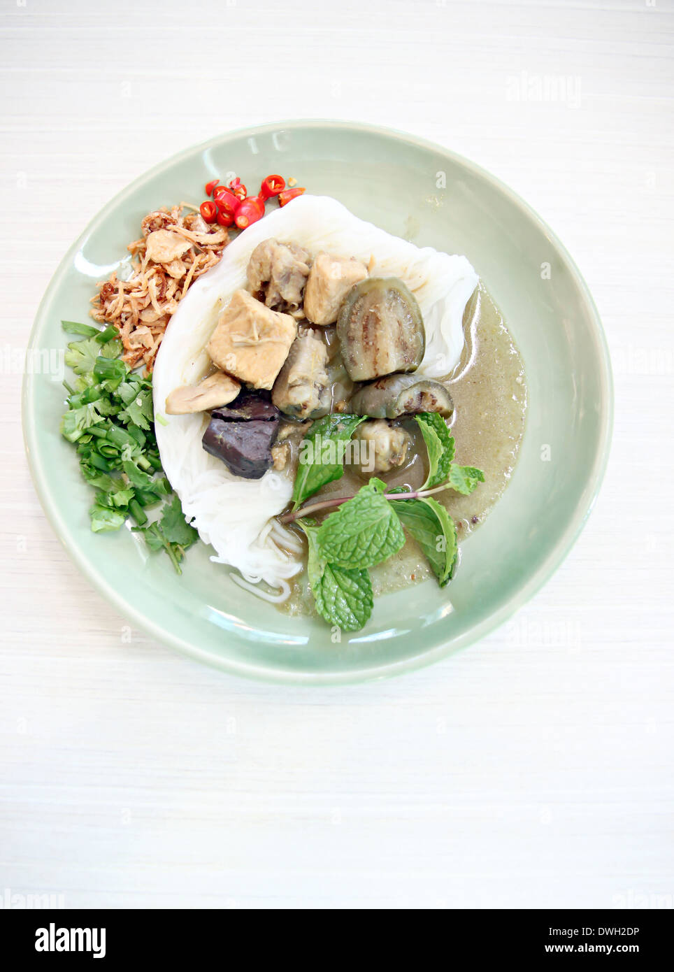 Curry chicken noodles (KHANOM CHIN) with vegetable Stock Photo - Alamy