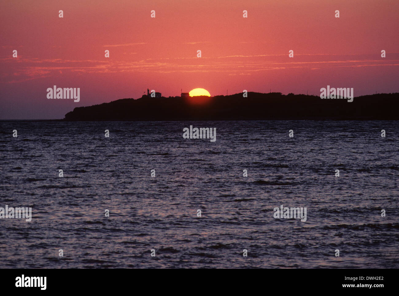 Sunset over ocean, Rocky Harbour, Gros Morne National Park ...