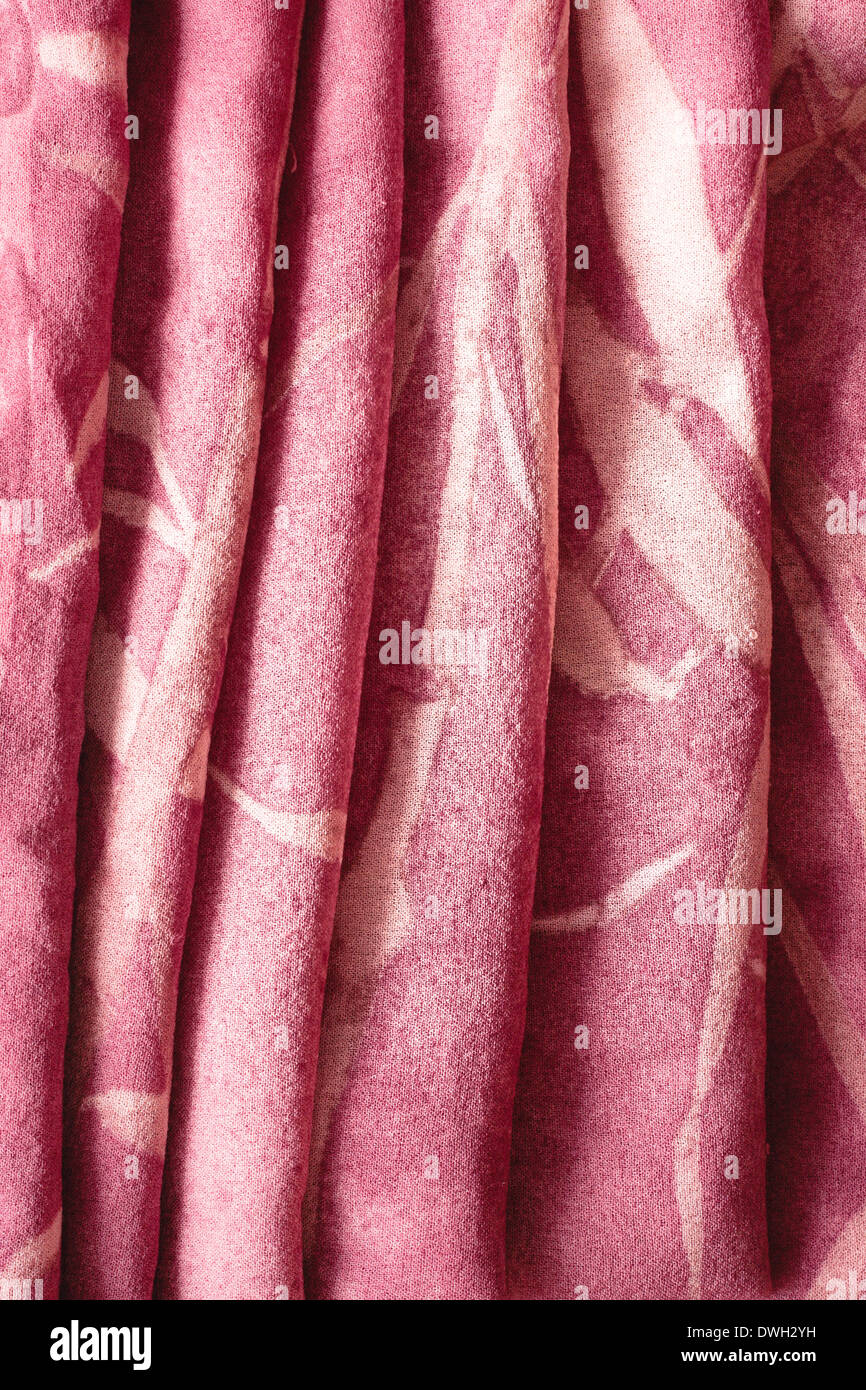 Folded pink cloth as a background image Stock Photo - Alamy