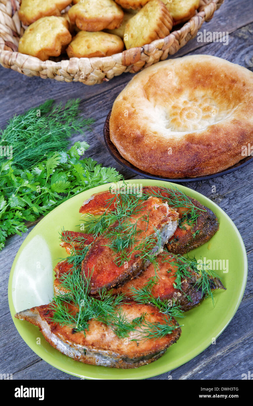 Still-life with fried fish and bread Stock Photo - Alamy