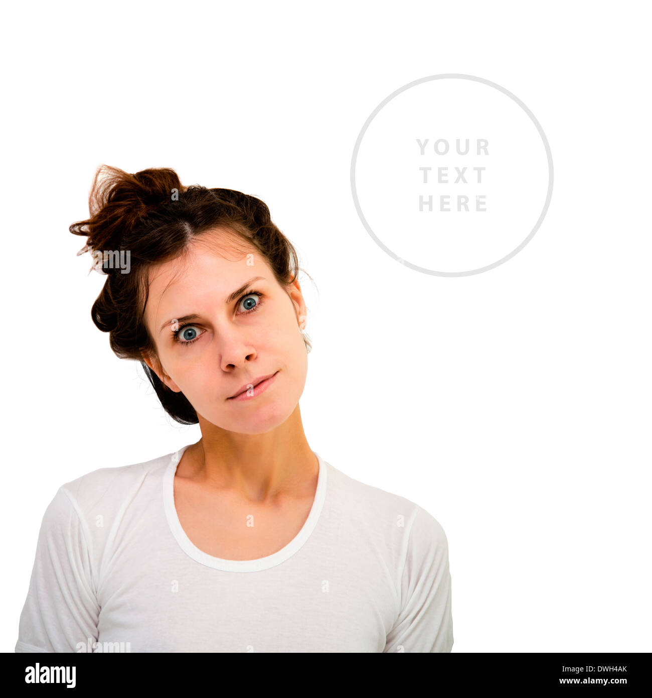 Young woman with attentive expression against white background with ...