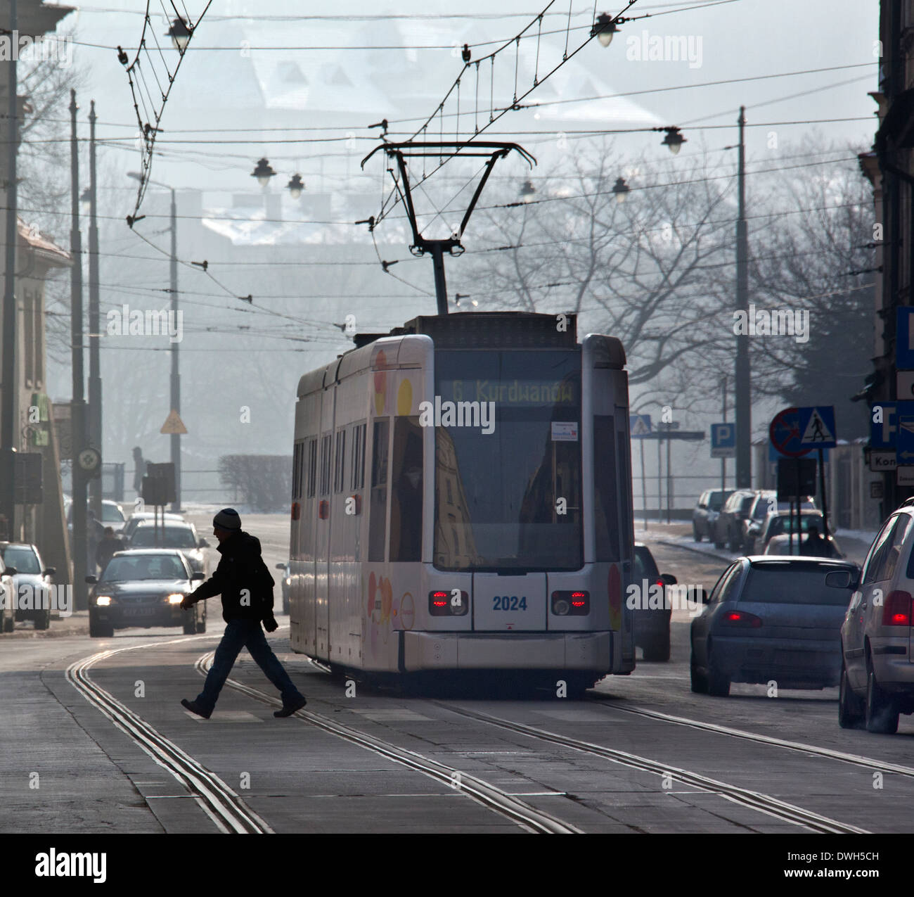 A tram on a busy street in the city of Krakow in Poland Stock Photo - Alamy