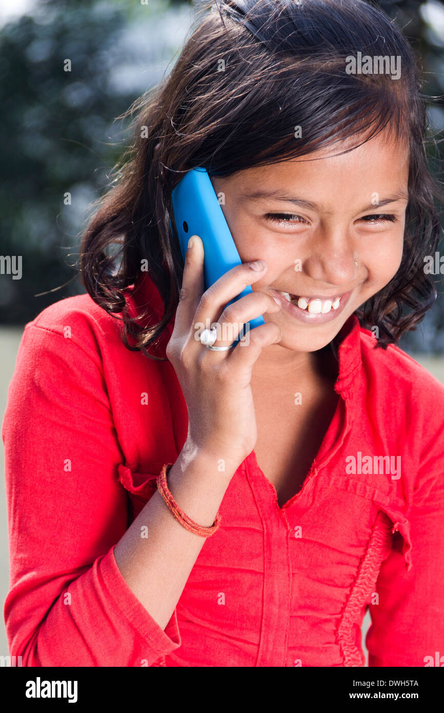 1 Indian kids talking with mobile Stock Photo - Alamy