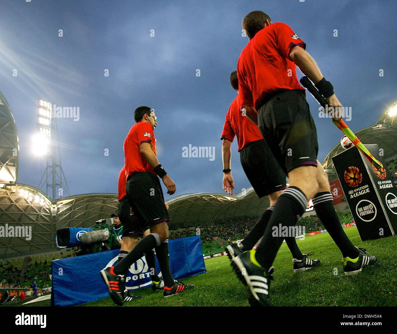 Melbourne, Victoria, Australia. 7th Mar, 2014. The referees walk onto ...