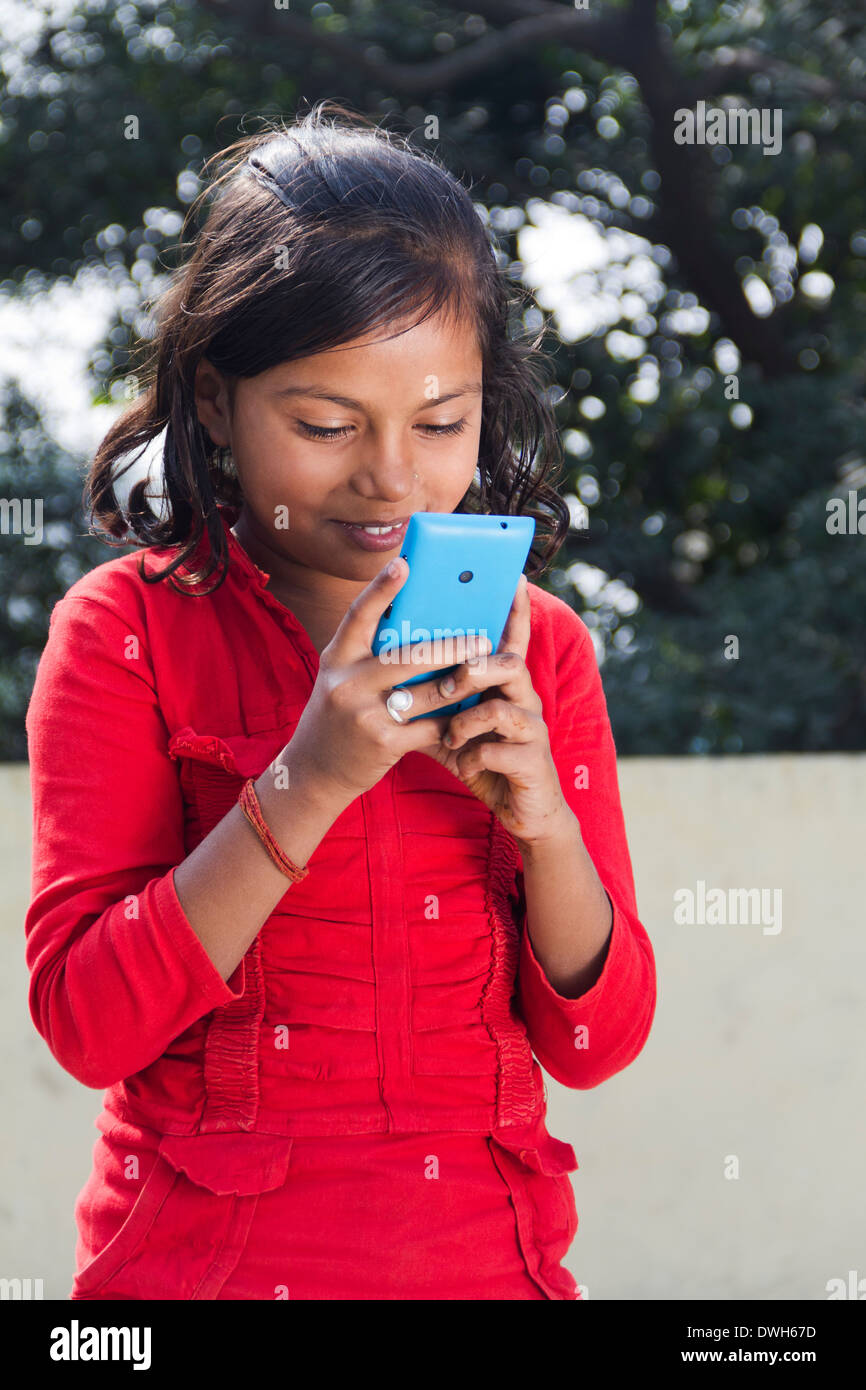 1 Indian kids standing with mobile Stock Photo - Alamy