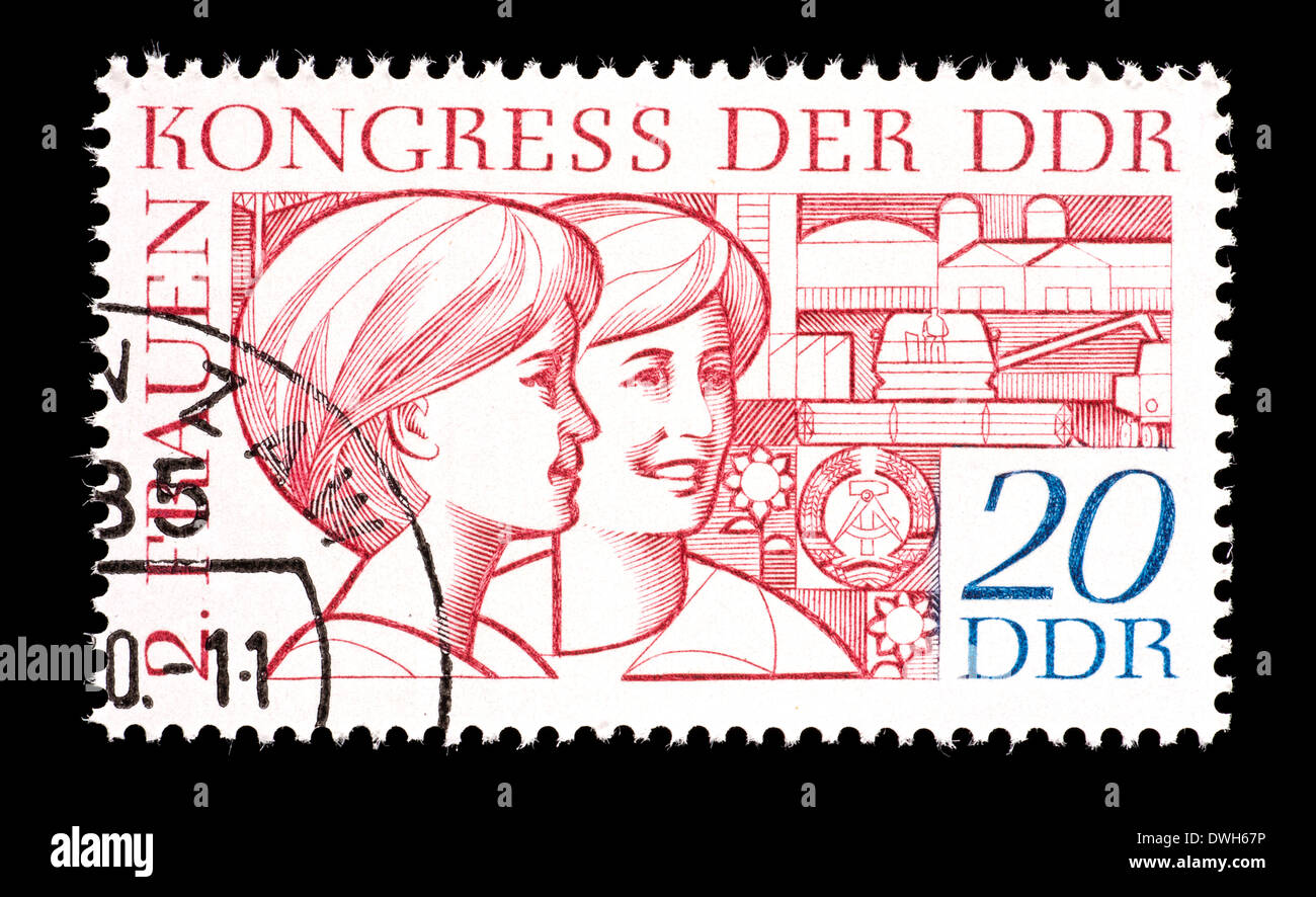 Postage stamp from East Germany (DDR) depicting women and symbols of ...