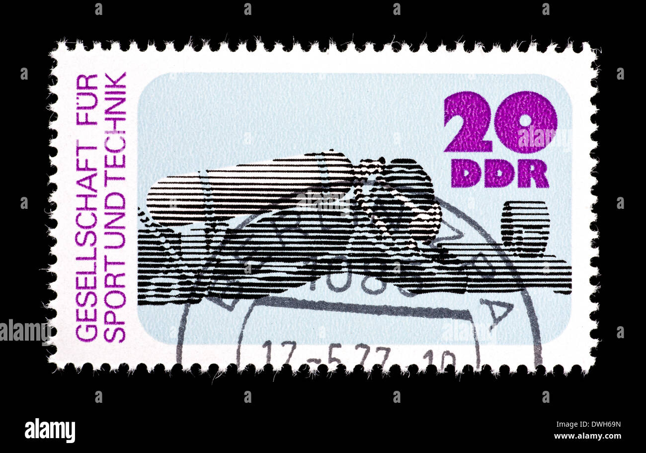 Postage stamp from East Germany depicting a deep sea diver with scuba ...