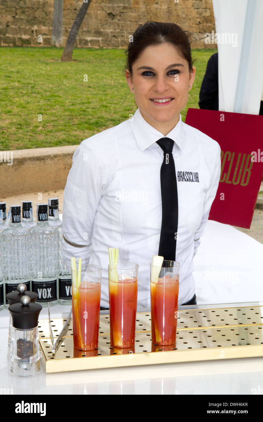Barmaid cocktails glasses in Mallorca Spain Stock Photo - Alamy