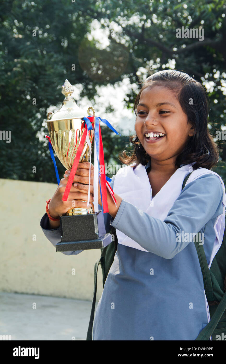 Indian school children showing trophies hi-res stock photography and ...