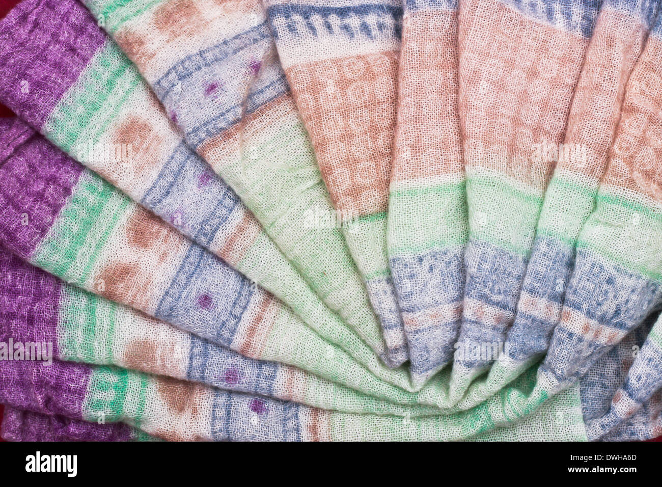 Folded cotton fabric with pastel colors as a background Stock Photo - Alamy