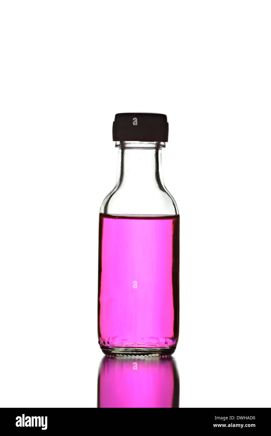 Violet water in bottle isolated on white background Stock Photo - Alamy