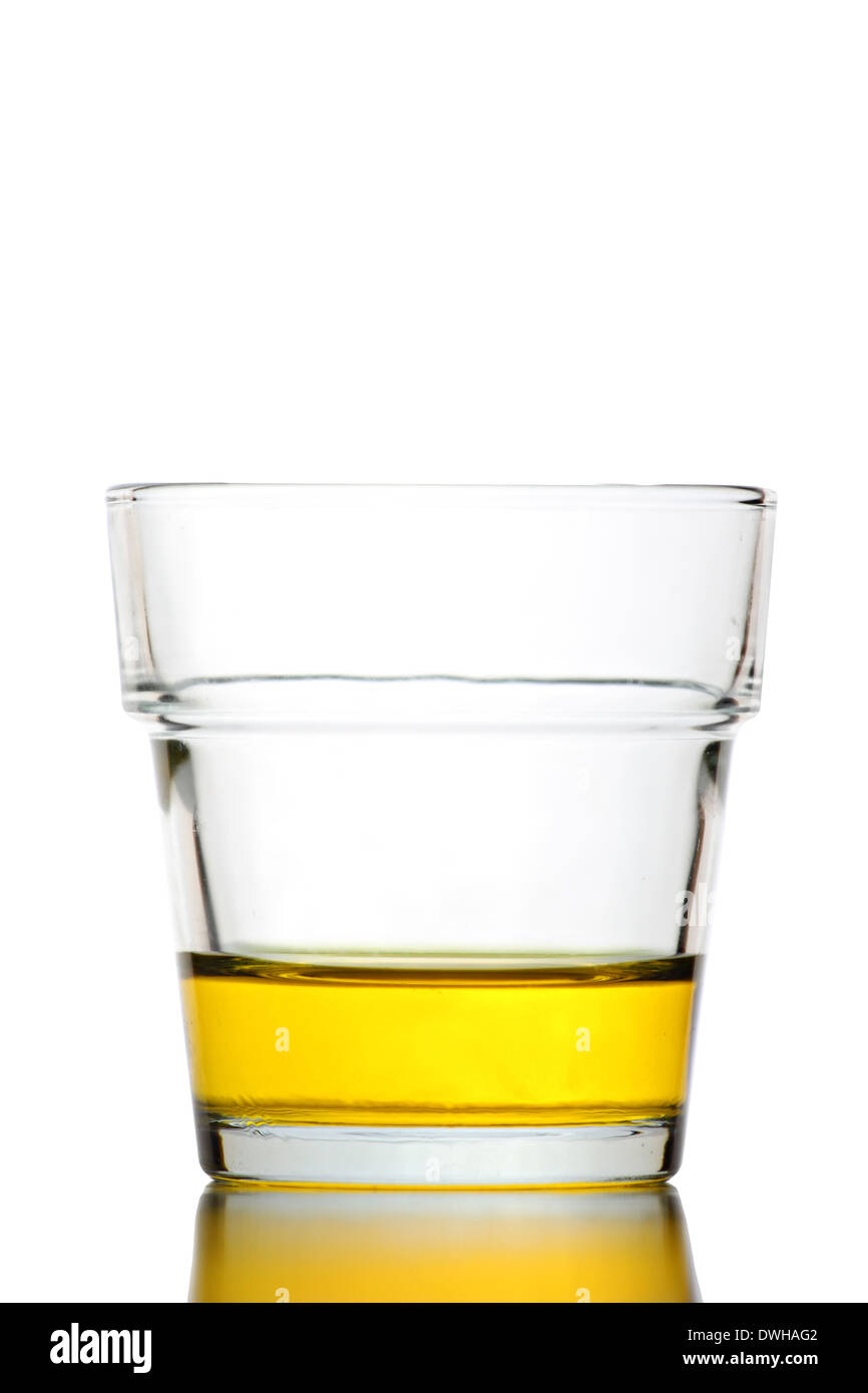 Yellow water in Glass isolated on white background Stock Photo - Alamy