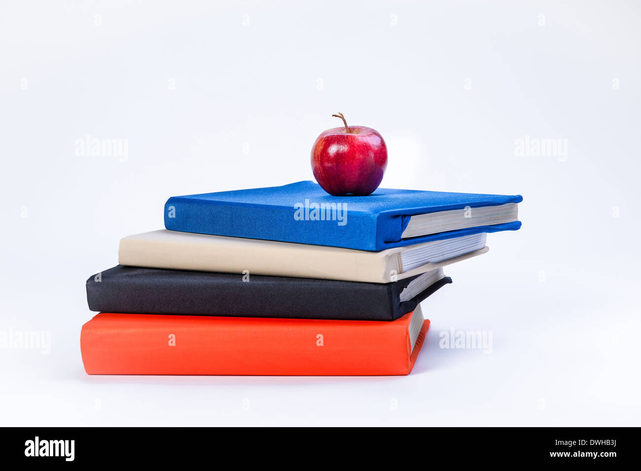 A concept image of a stack of books with an apple on the top Stock ...