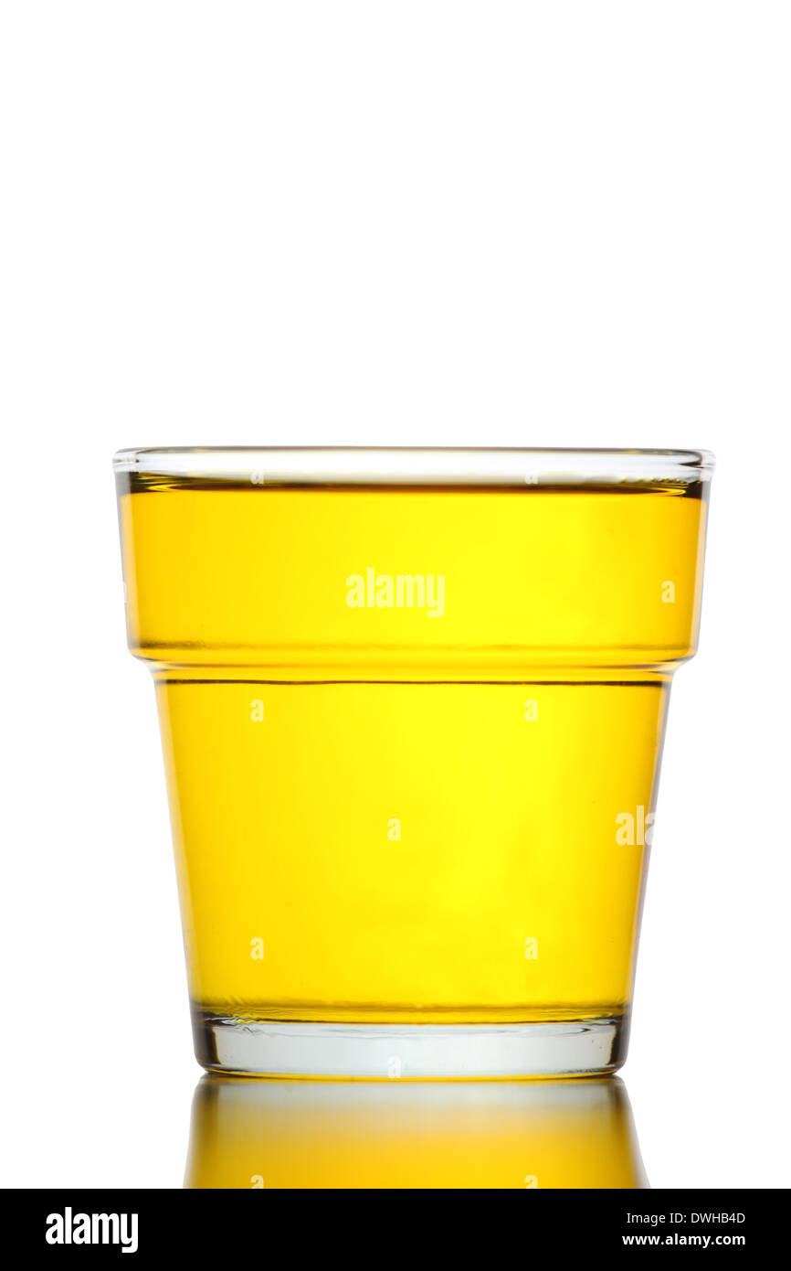 Yellow water in Glass isolated on white background Stock Photo - Alamy