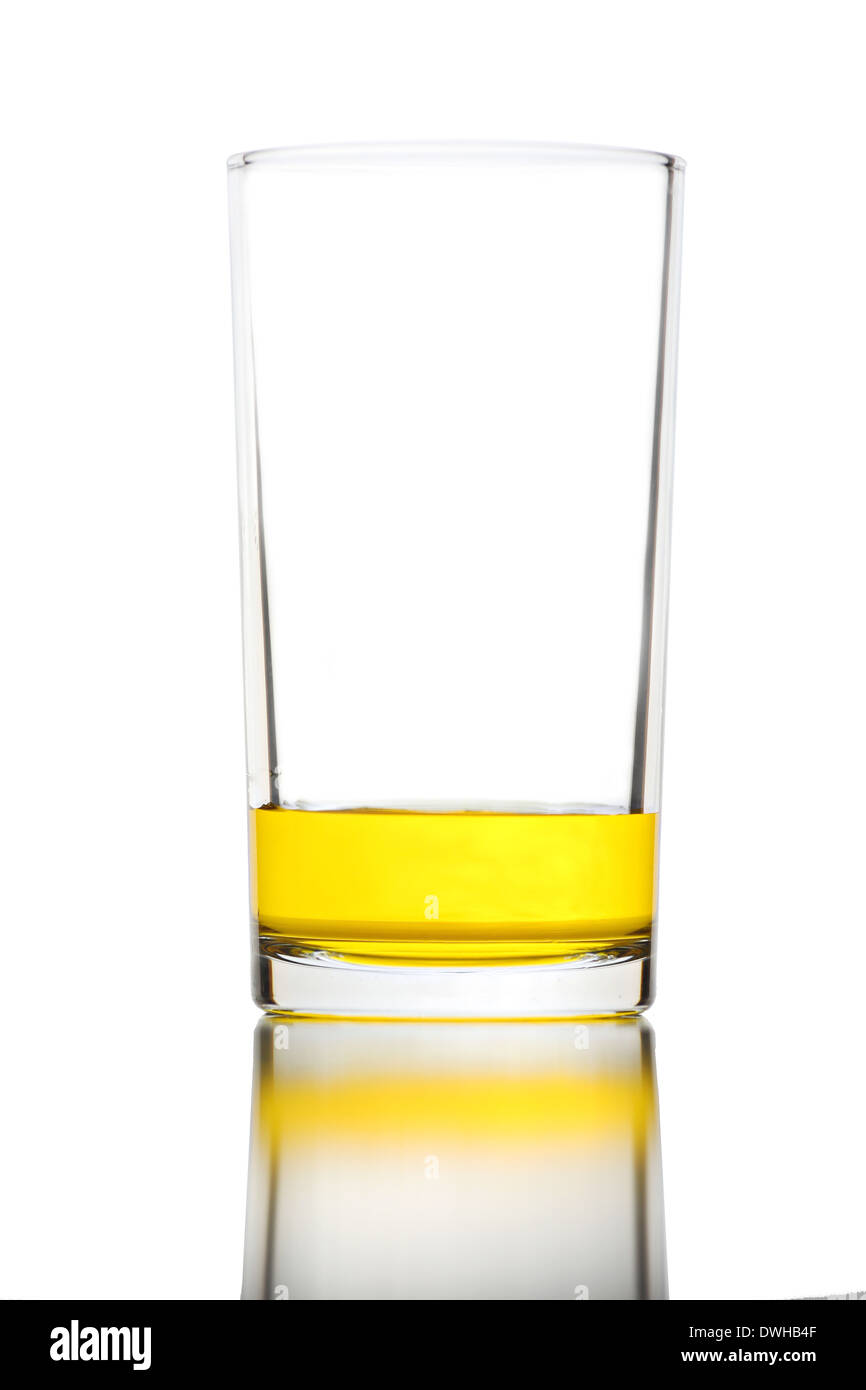 Yellow water in Glass isolated on white background Stock Photo - Alamy