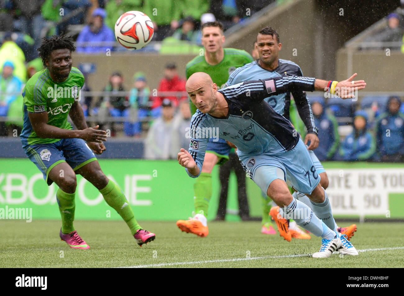 Seattle, USA. 8th March, 2014. Sporting KC defender Aurelien Collin #78 ...
