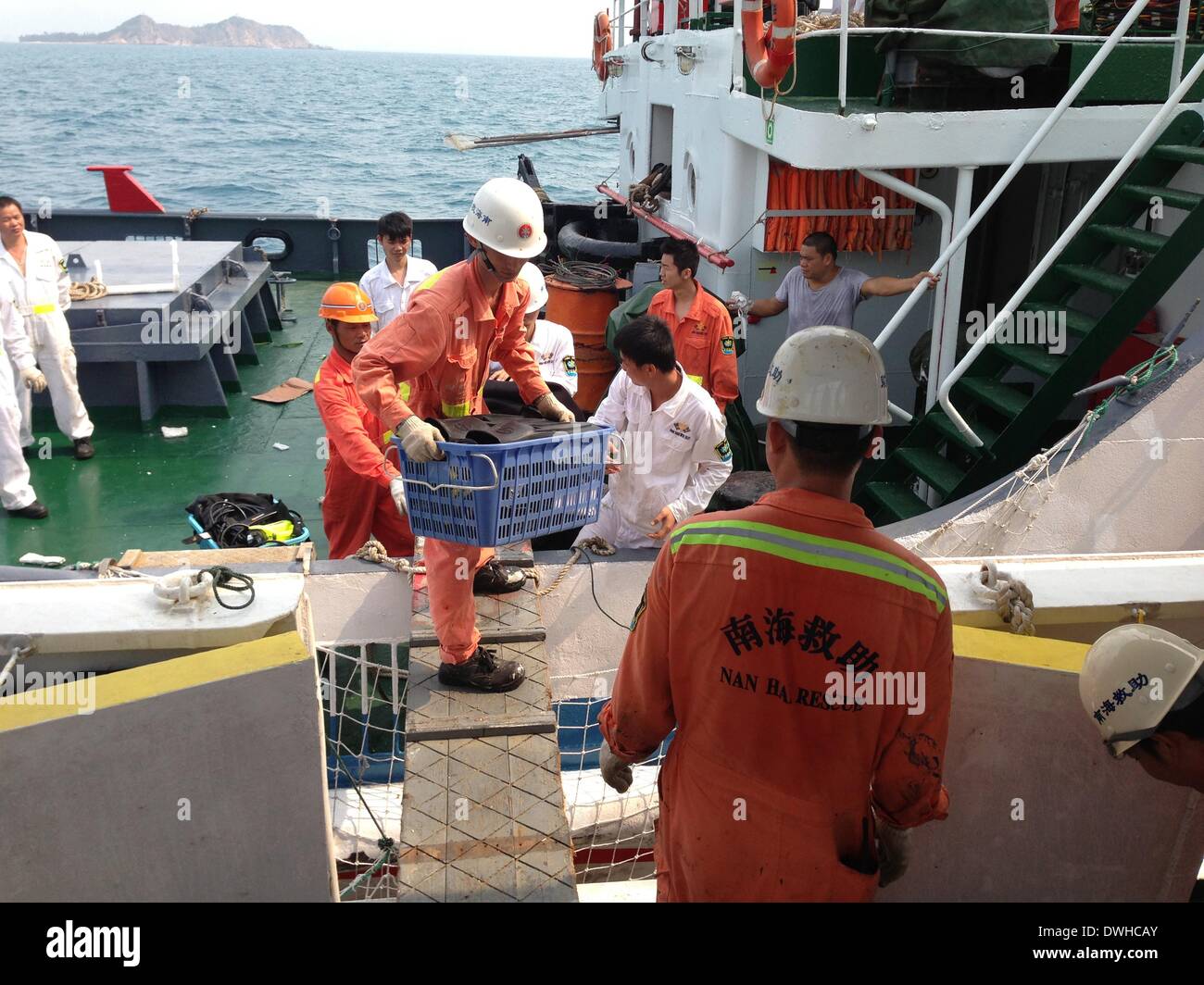 Sanya, China. 9th March, 2014. Members of a Chinese emergency response ...