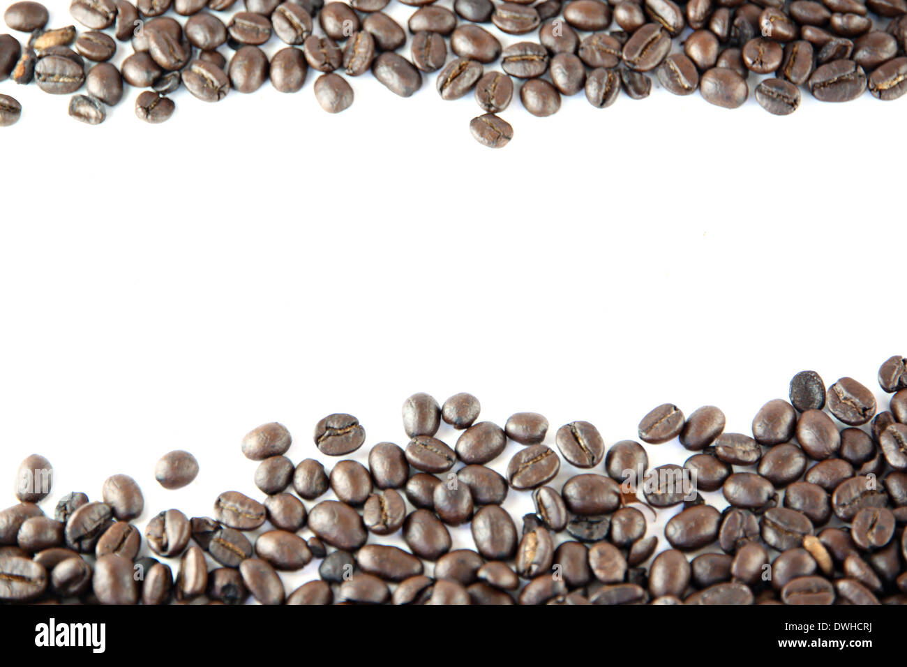 Roasted coffee beans in frame on white background Stock Photo - Alamy