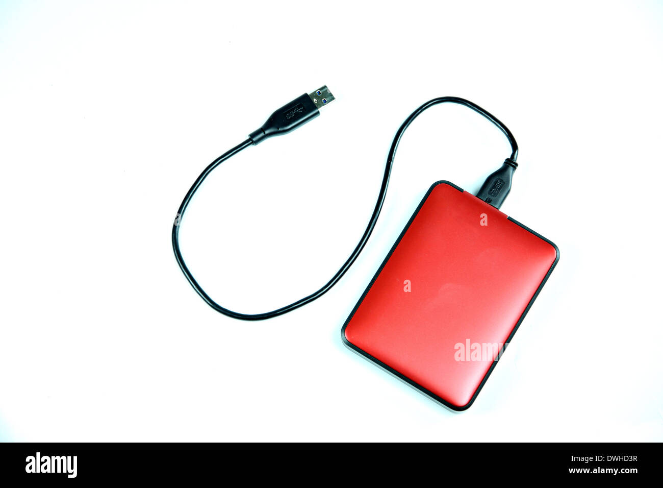 Red external hard disk isolated on white background Stock Photo - Alamy