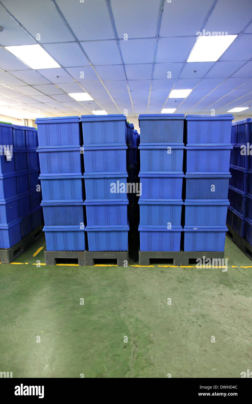 The blue Plastic box products in Industrial factory room Stock Photo ...