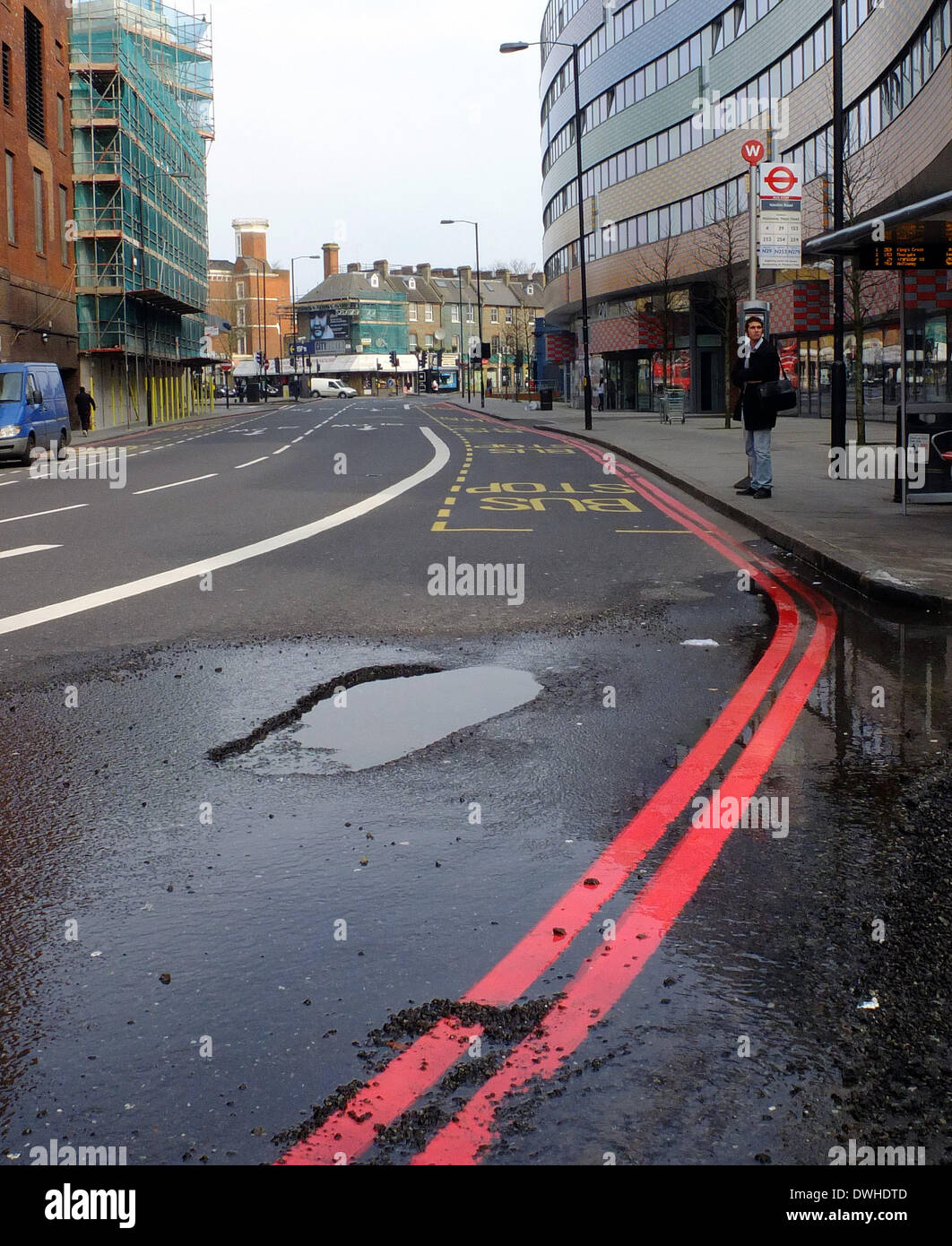 Pothole . . London, UK. 8th March, 2014. A big pothole in the road has ...