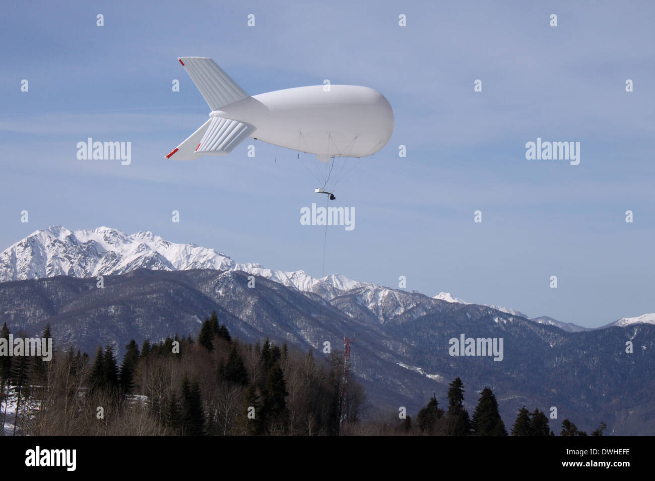 aerostat with television camera above mountains Stock Photo - Alamy
