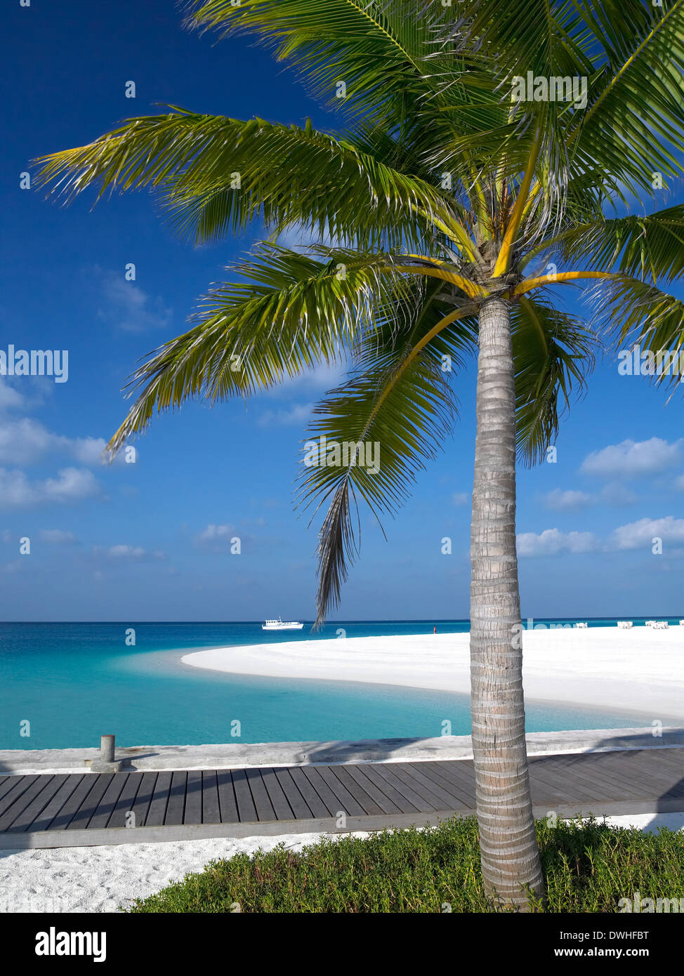 Tropical beach resort on a small private island in the Maldives in the ...