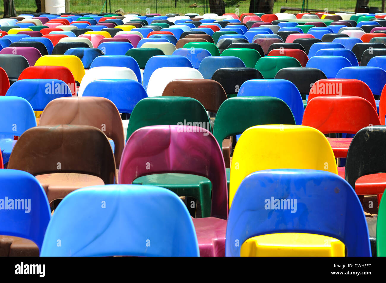 Colourful plastic chairs hi-res stock photography and images - Alamy