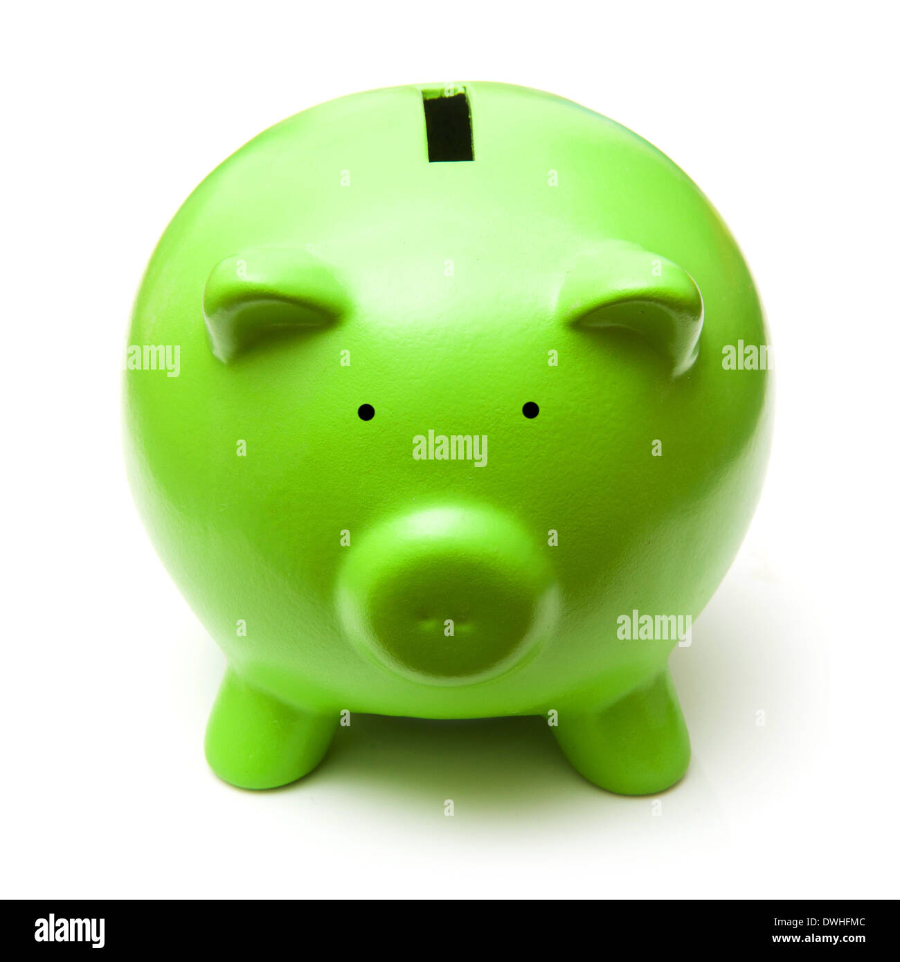 Green piggy bank money box isolated on a white studio background Stock ...