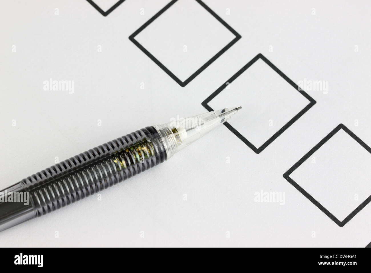 Mechanical pencil point to checkbox on white background Stock Photo - Alamy