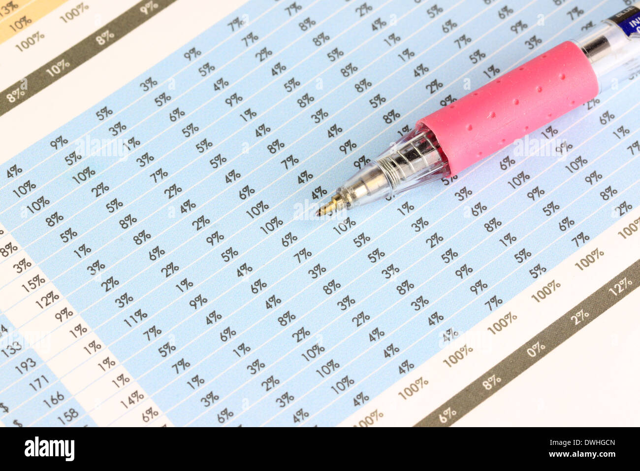 Pink pen point to number on business graph Stock Photo - Alamy