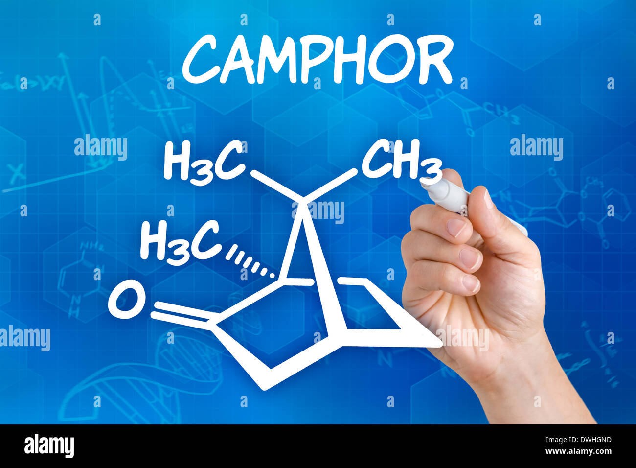 Hand with pen drawing the chemical formula of camphor Stock Photo - Alamy