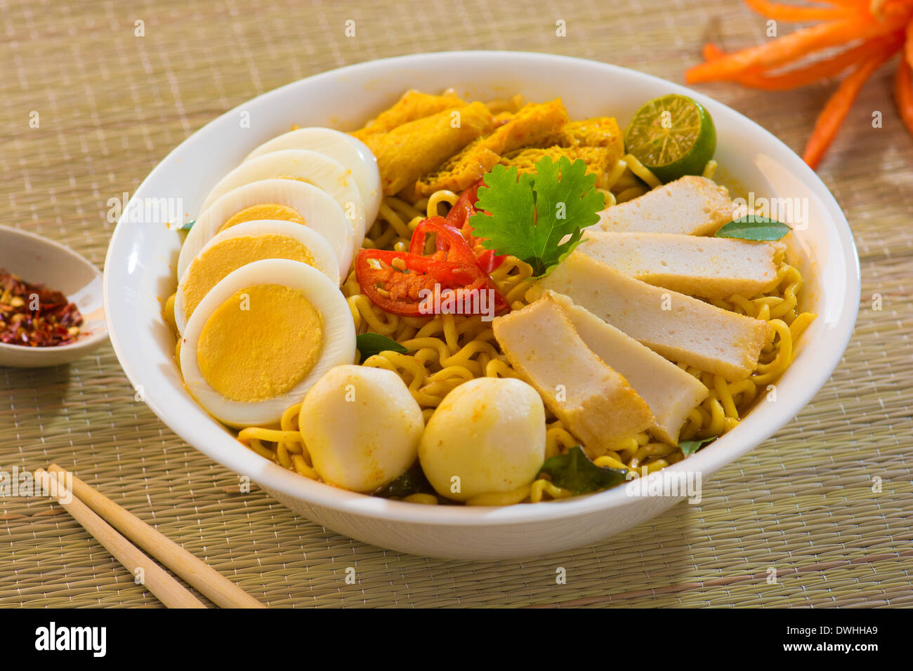 Hot and spicy Singapore Curry Noodle with decoration setup Stock Photo ...