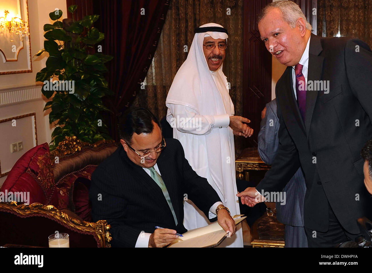 Cairo, Egypt. 8th Mar, 2014. Egyptians and Arab officials attend the ...