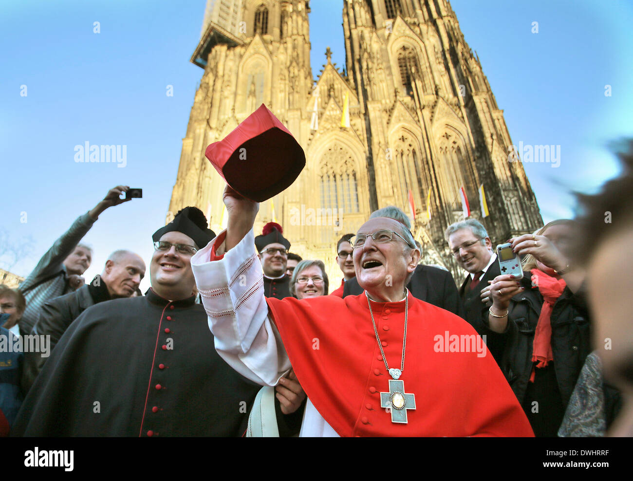 Cologne, Germany. 09th Mar, 2014. Cardinal Meisner waves during his ...