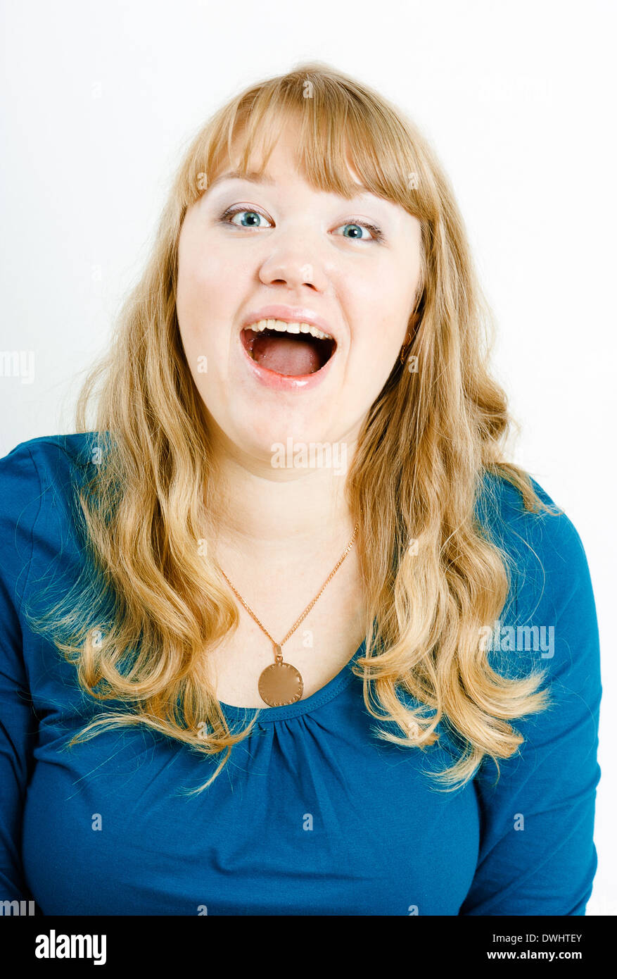 portrait of a young blonde woman screaming Stock Photo - Alamy