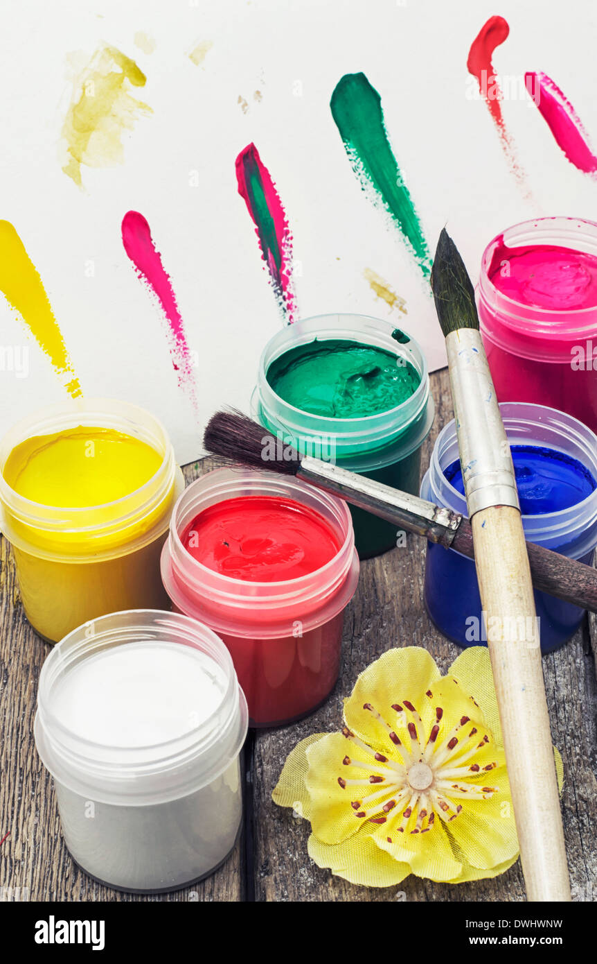 paint for painting and composition with spring flowers Stock Photo - Alamy
